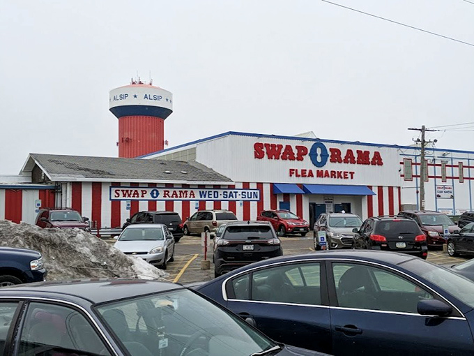 The iconic red-striped building beckons shoppers like a carnival tent promising endless treasures within.
