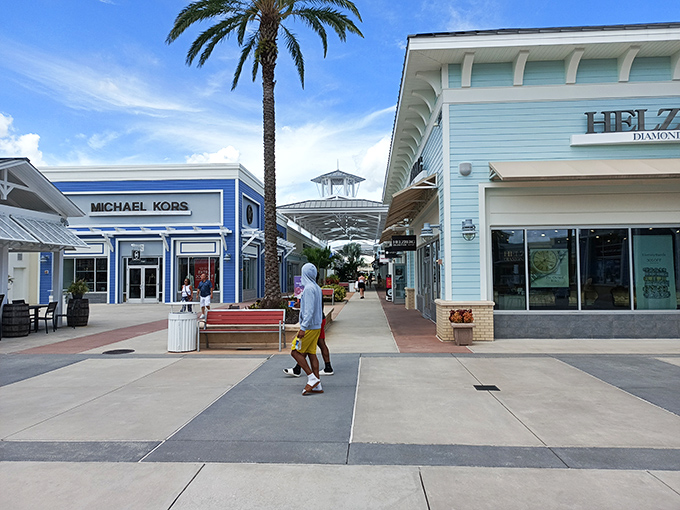 Michael Kors and coastal-inspired architecture create a shopping oasis. Like a resort where the main activity is finding incredible deals.