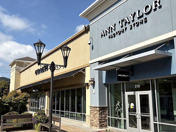 Charming storefronts and decorative lanterns create an inviting atmosphere where shopping feels like strolling through town.