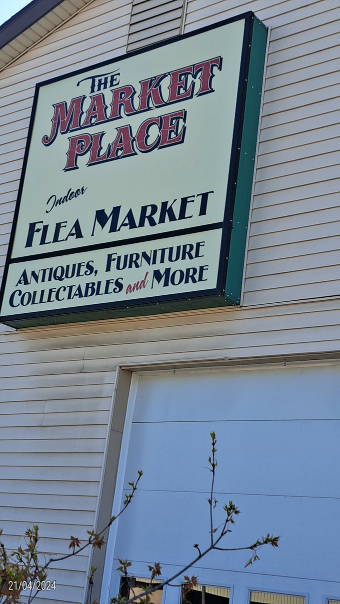 The Market Place sign beckons bargain hunters into a world where flea market dreams come true daily.