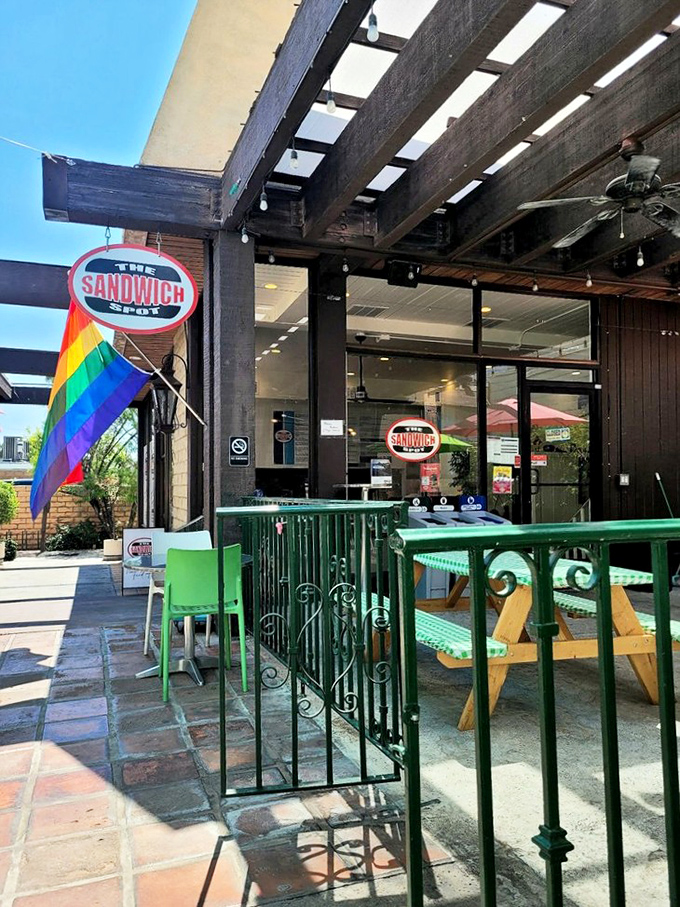 Desert dining perfection: colorful umbrellas, perfect weather, and sandwiches worth the Palm Springs pilgrimage every time.