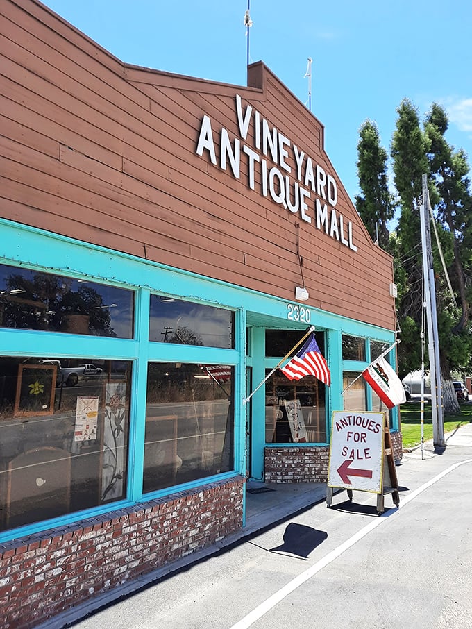 Vineyard Antique Mall's rustic brown exterior with turquoise trim - a time capsule nestled among Paso Robles' rolling hills.