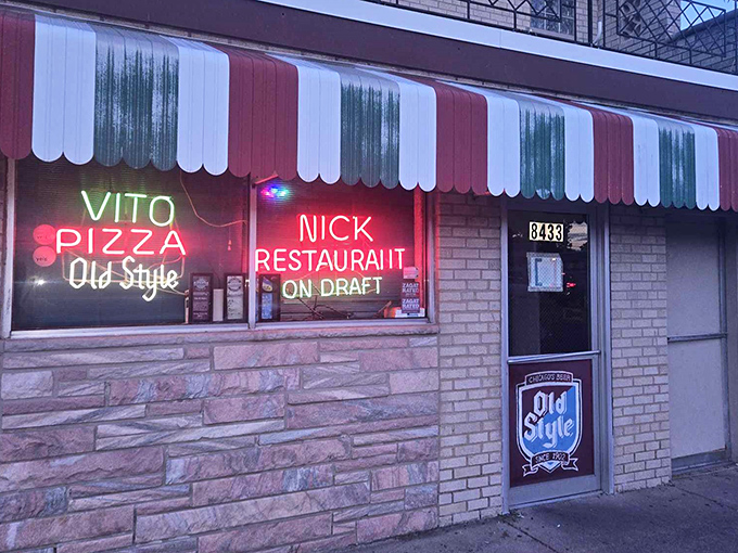 That striped awning screams old-school Chicago louder than Sinatra at a Sox game &ndash; pure South Side magic.