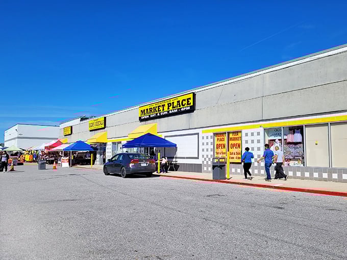Yellow sign, endless finds! Washington Boulevard Marketplace stands ready to welcome shoppers seeking both necessities and novelties.