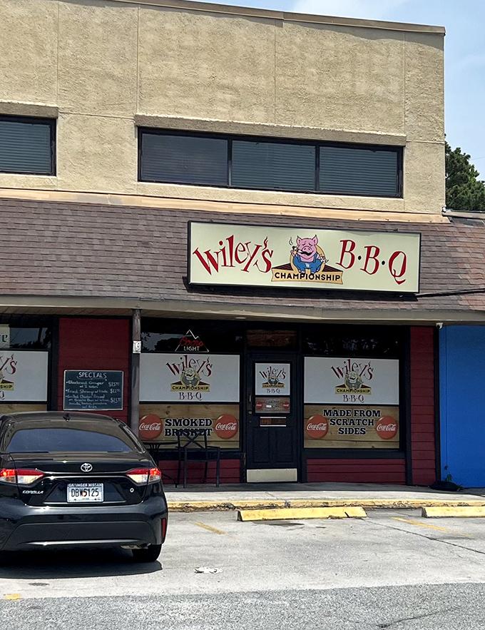 That cheerful pig mascot knows exactly what he's advertising - championship-level ribs worth every single mile driven.