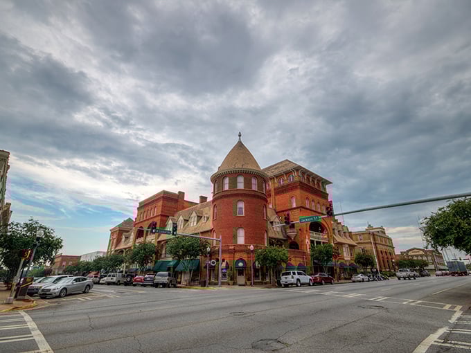 The Windsor Hotel's Victorian turrets command Americus' skyline, a dramatic backdrop worthy of a Southern gothic novel.