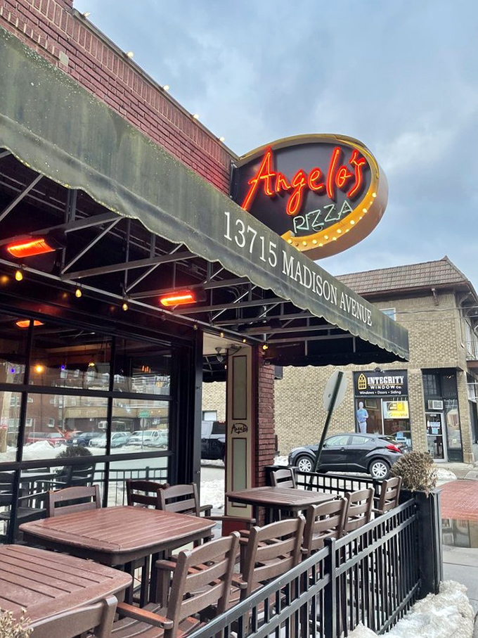 That glowing neon sign has been calling pizza lovers home for years, like a delicious North Star.