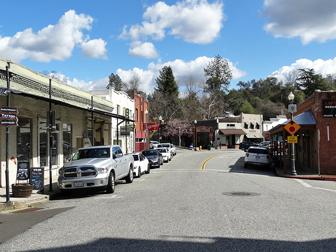 Spring blooms and classic architecture create the perfect small town symphony where every storefront plays its part in California's charm.