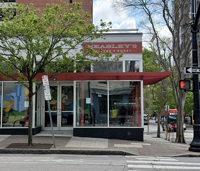 The sleek storefront hints at elevated comfort food where honey meets perfectly seasoned fried chicken.