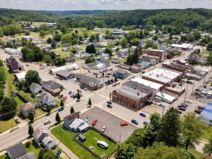 A traffic light hangs over this charming crossroads where the biggest rush hour might involve two cars waiting their turn.