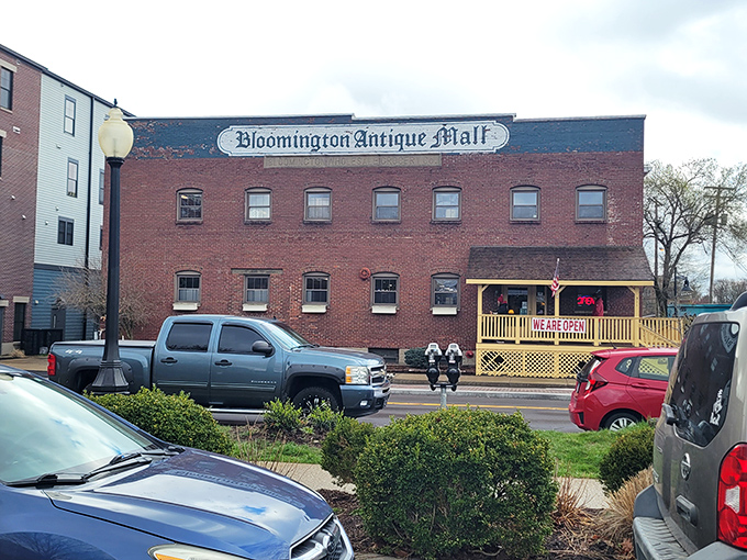 The brick facade tells one story, but those "We Are Open" signs tell the better one&mdash;treasures await inside this historic building.