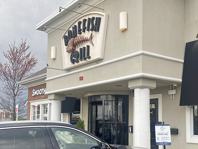 The understated entrance hides a seafood sanctuary. Those potted plants aren't just for show&mdash;they're standing guard over some seriously good fish.