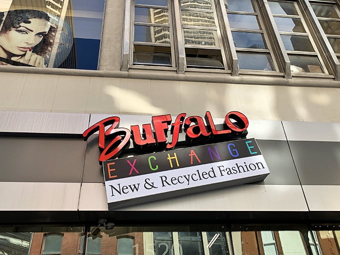The colorful Buffalo Exchange sign stands proud against Philadelphia's urban backdrop, a beacon for budget fashionistas.