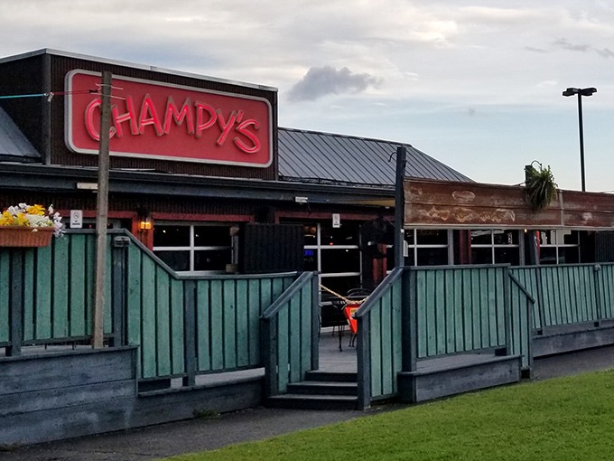 Those red umbrellas aren't just for show - they're marking the spot where chicken dreams come true at Champy's.