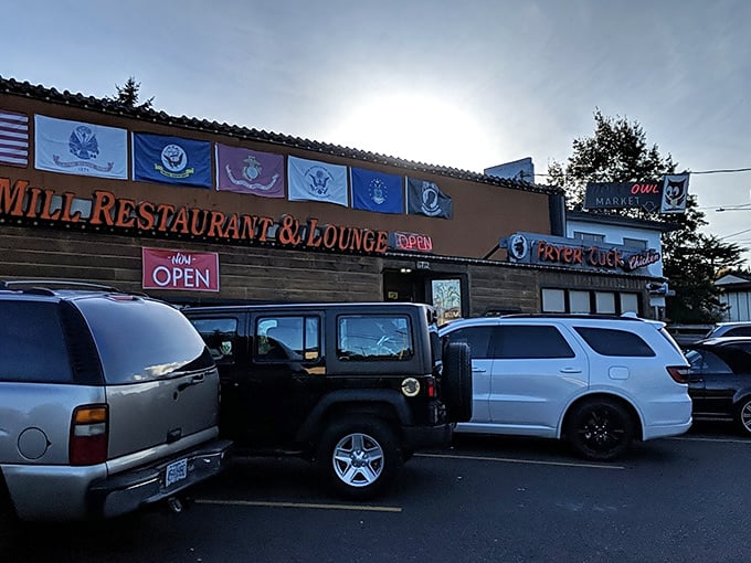Those flags tell a story of respect, while inside they're crafting chicken worth saluting.