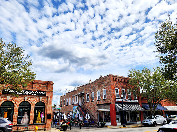 Fluffy clouds hover over Conway's charming brick buildings. This is small-town South Carolina at its picturesque best.