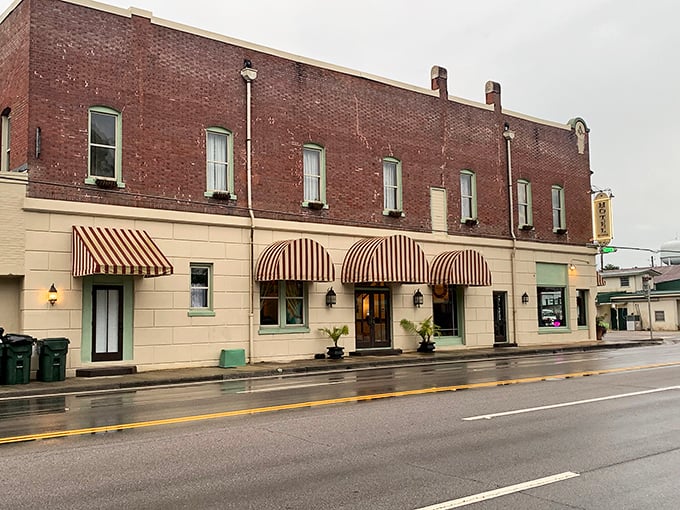 This brick beauty in DeFuniak Springs whispers stories of yesteryear, with those classic striped awnings practically begging you to window shop.