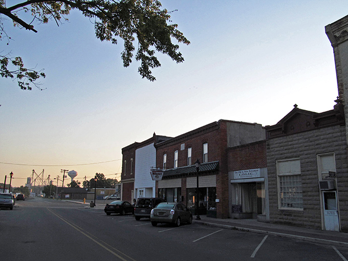 Main Street stretches out like a friendly handshake between two states sharing one heart. 