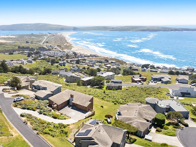 This aerial perspective shows the perfect curve of coastline that makes every photo look professionally shot.