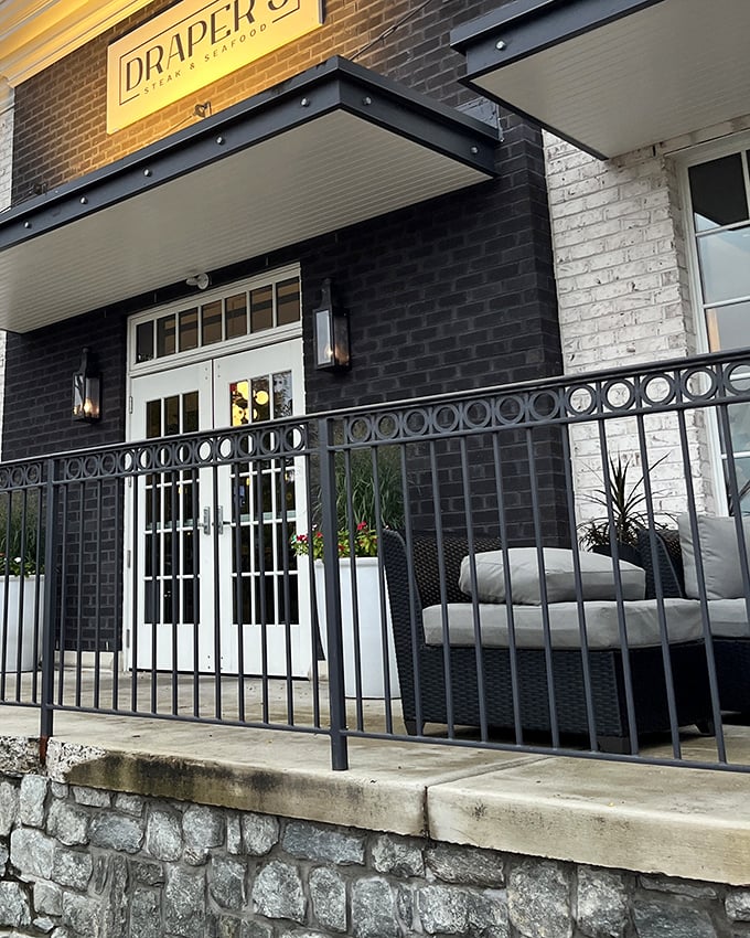 Those black shutters frame windows to culinary heaven where every cut gets the royal treatment it deserves.