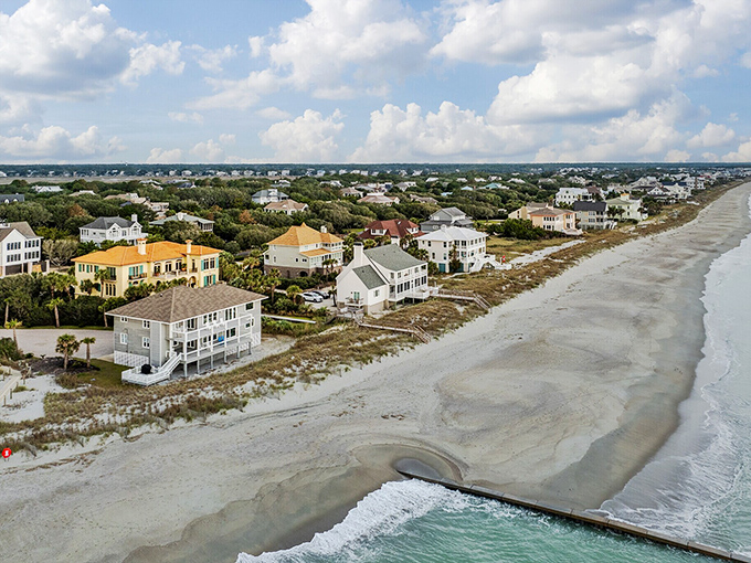 Folly Beach houses stand like sentinels against the sea, painted in hues that make every sunrise feel personal.