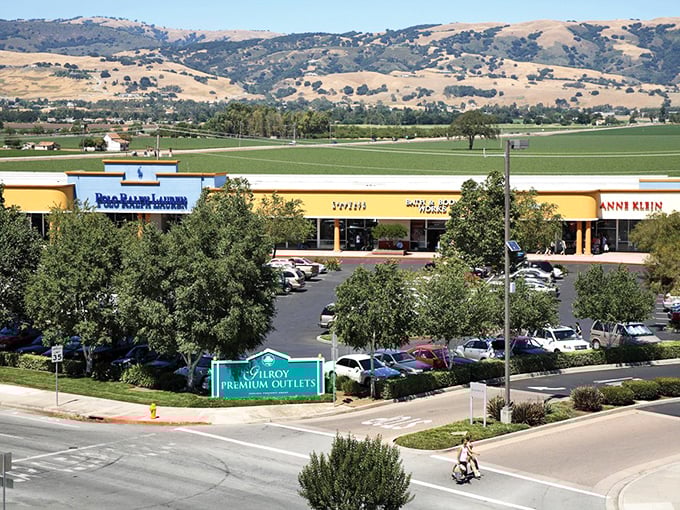 Gilroy's outlets spread out beneath golden California hills. Come for the garlic festival, stay for the shopping spree!