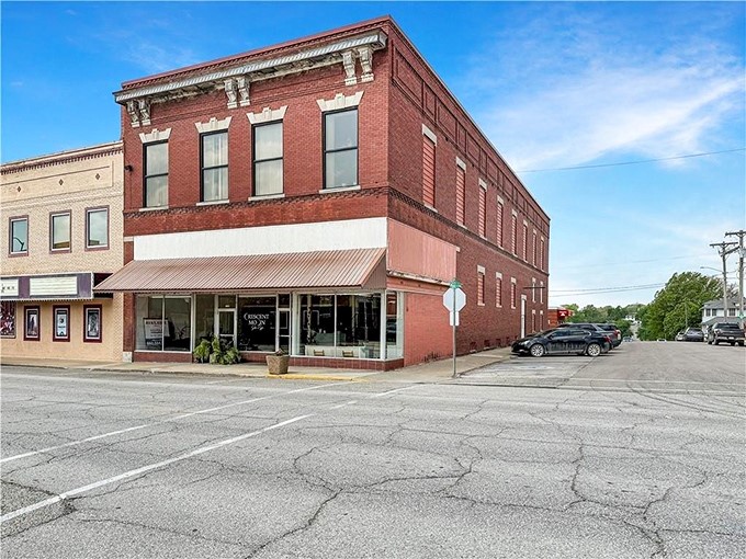Corner buildings where community conversations happen naturally and time moves at perfect speed.