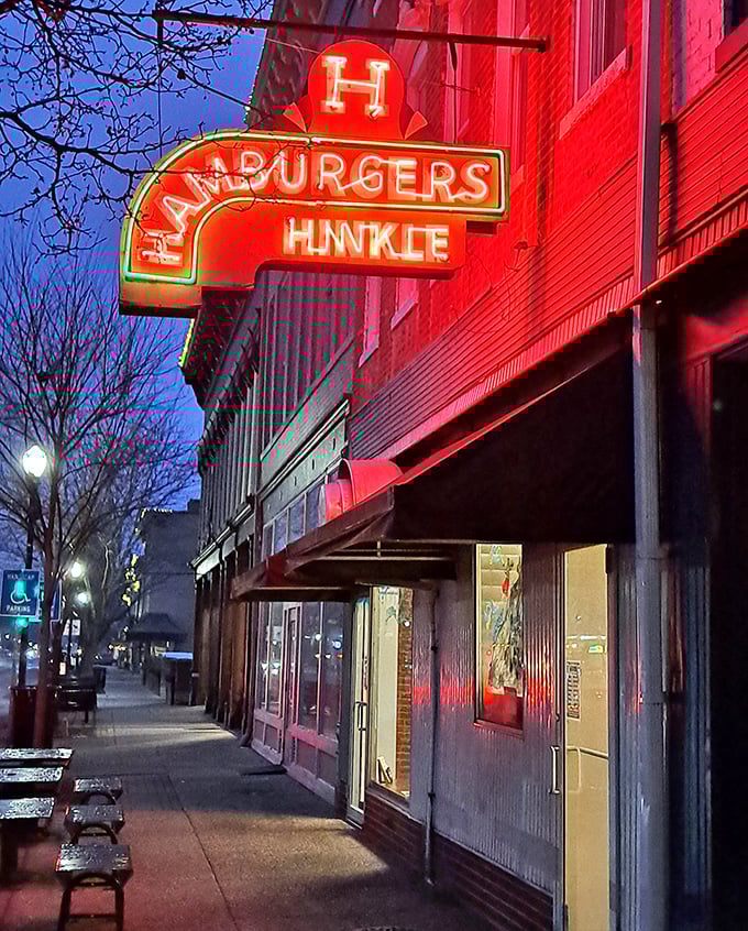 Hinkle's glows with nostalgic charm after dark, a beacon for hungry night owls seeking comfort between bread.