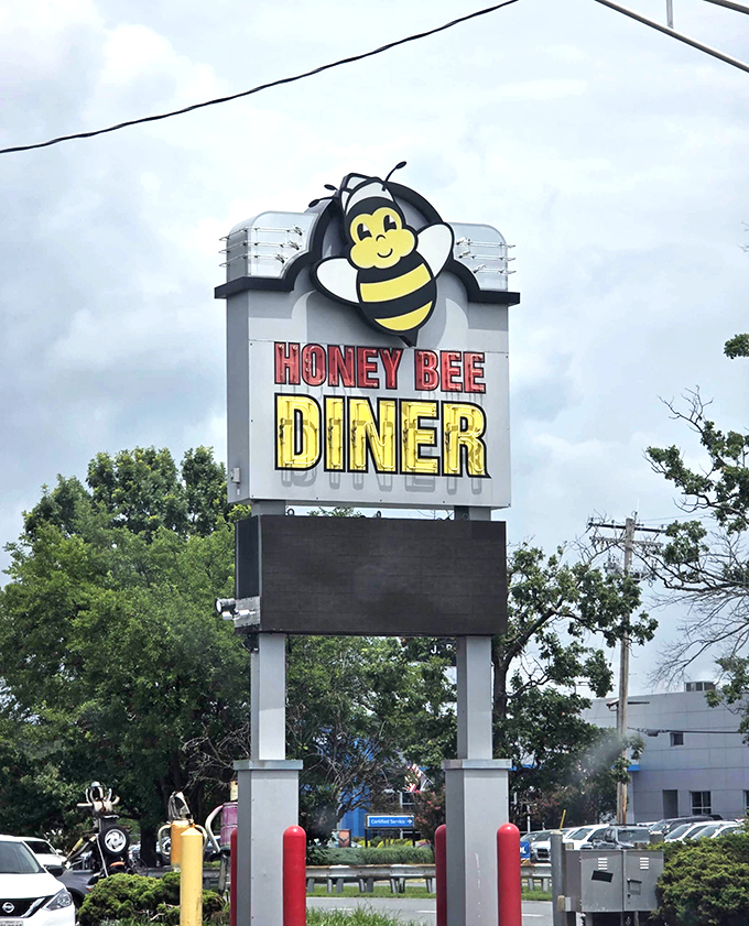 That smiling bee knows what's up. Honey Bee Diner stands ready to cure what ails you with pancakes larger than your plans.