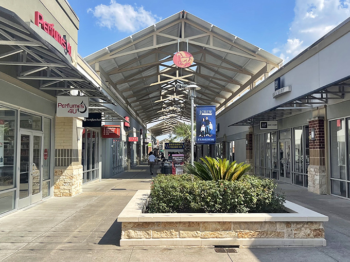 Covered walkways with fans overhead - because Texas heat shouldn't stop your shopping momentum.