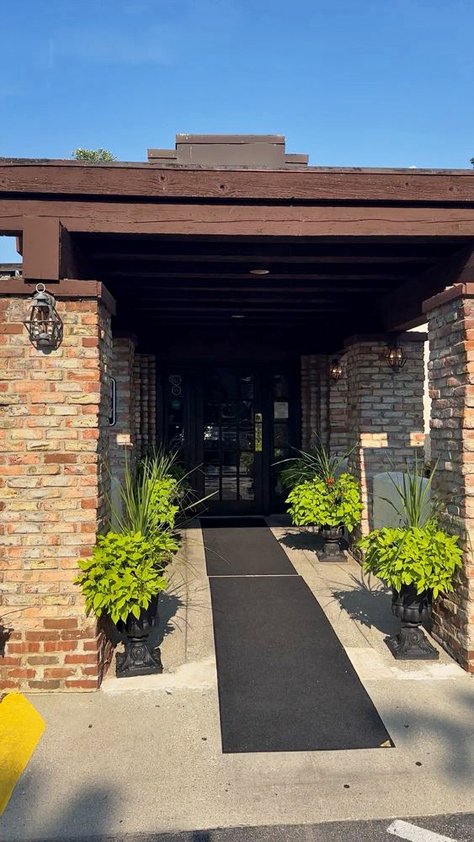 The entrance alone suggests the kind of upscale dining experience where every bite justifies the anticipation building up.