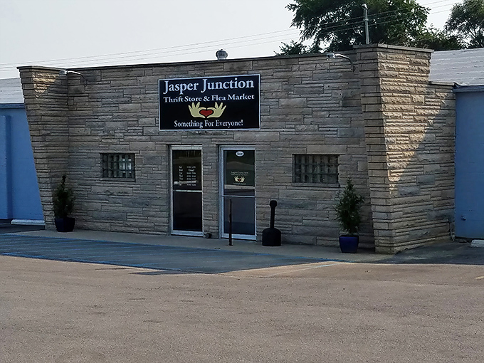 The stone entrance welcomes treasure hunters to a flea market wonderland where discoveries wait around every corner.