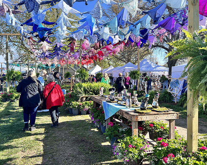 Festival-style shopping meets serious treasure hunting under cheerful decorations and blue Nebraska skies above.