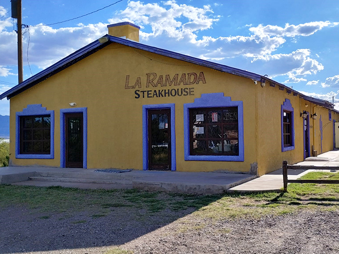 Against the backdrop of Arizona's mountains, this cheerful yellow steakhouse promises sunset views that compete with the steaks for attention.