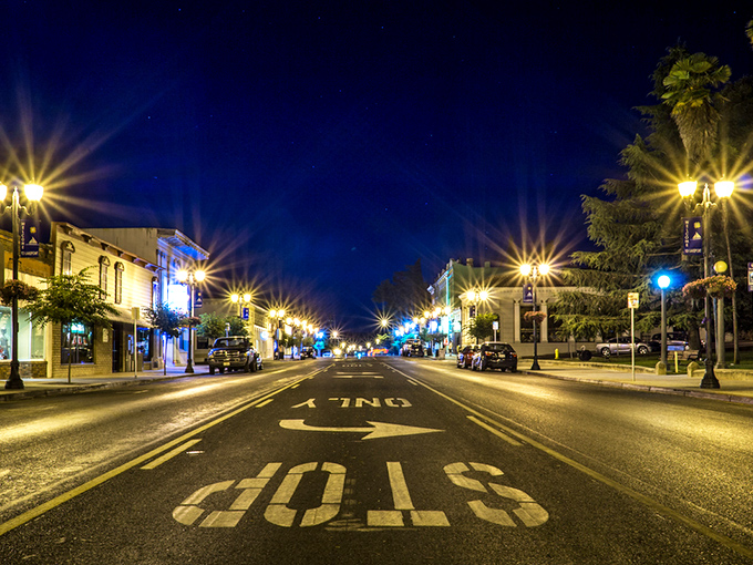 Midnight in Mayberry! Lakeport's street lamps pierce the inky darkness like fireflies, creating that "I could totally retire here" vibe that big cities can't bottle.