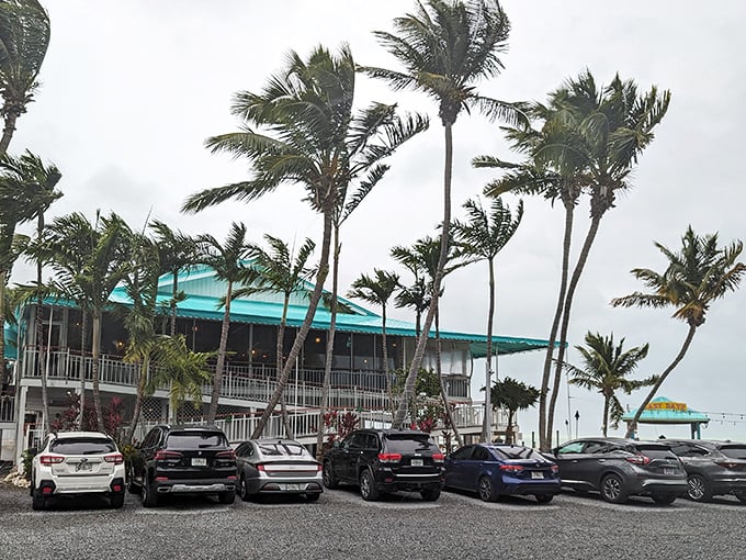 That thatched roof isn't just charming &ndash; it's the universal signal for "kick off your shoes and prepare for seafood bliss."