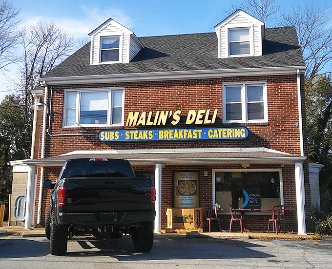That yellow signage practically glows with the promise of fresh-made comfort food waiting inside.