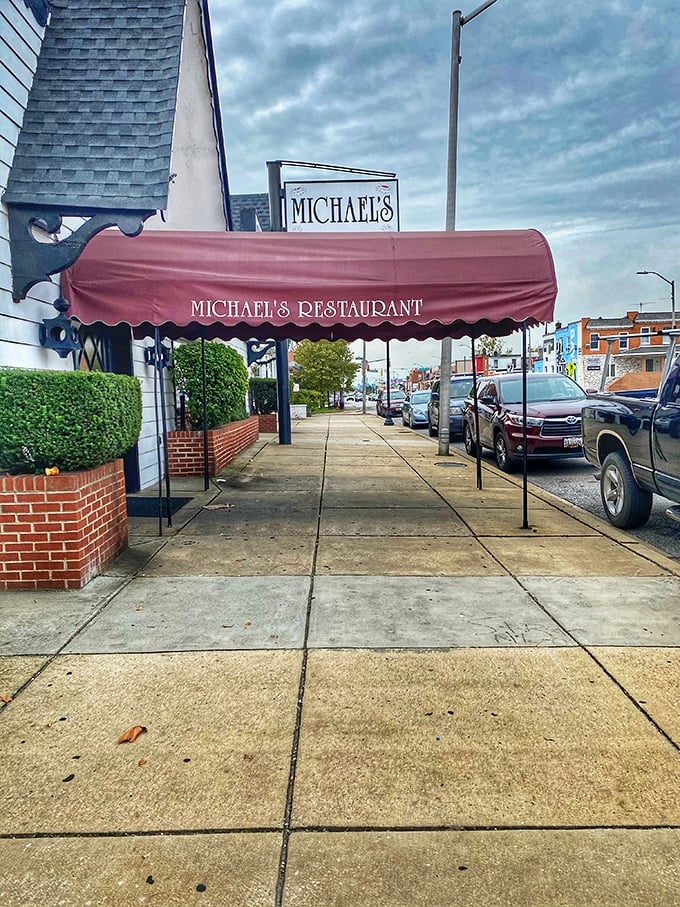 The red awning beckons like a beacon for beef lovers seeking authentic flavors.