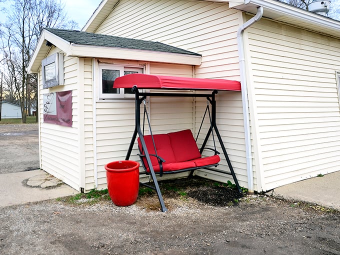 The red porch swing outside My Place Diner invites you to sit a spell after enjoying their legendary breakfast platters.