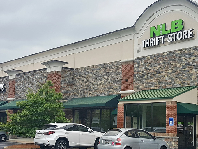 The green NLB sign shines like a beacon for bargain seekers. This isn't your grandmother's thrift store experience.