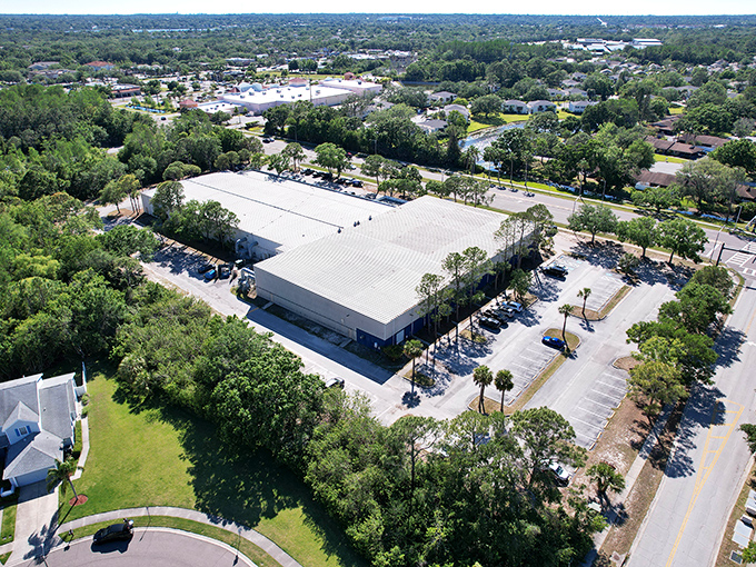 From above, Oldsmar's industrial complex plays hide-and-seek with nature&mdash;concrete jungle meets actual jungle in Florida's business-casual landscape.