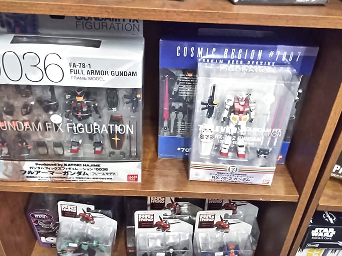 Gundam figures and collectibles create a nostalgia paradise where childhood dreams meet adult collecting passion perfectly.