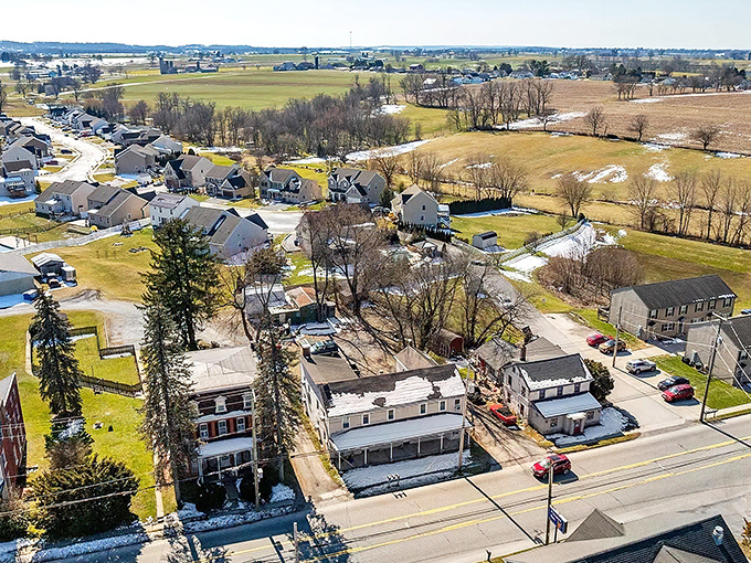 From above, Paradise reveals its patchwork quilt of homes and fields - a community designed by time rather than developers.