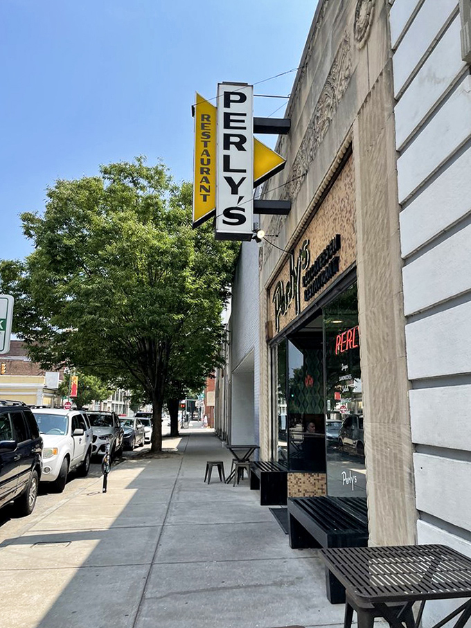 Street-side seating and classic architecture create the perfect backdrop for authentic deli experiences that never disappoint.