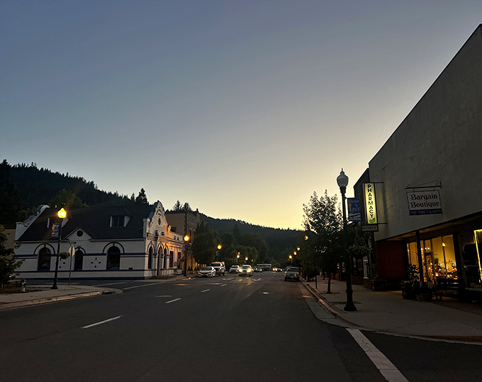 Evening light transforms this mountain town into something straight out of a cozy Christmas card collection.