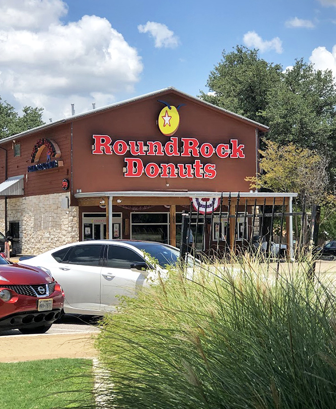 The rustic charm of Round Rock Donuts belies the culinary magic happening inside this beloved Texas institution.