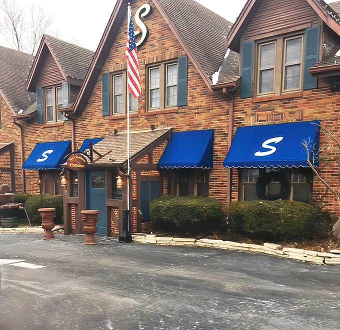 Blue awnings mark the spot where neighborhood dining reaches steakhouse perfection without the downtown fuss.