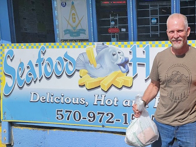 One happy customer with his seafood haul proves sometimes the best catches aren't near water.