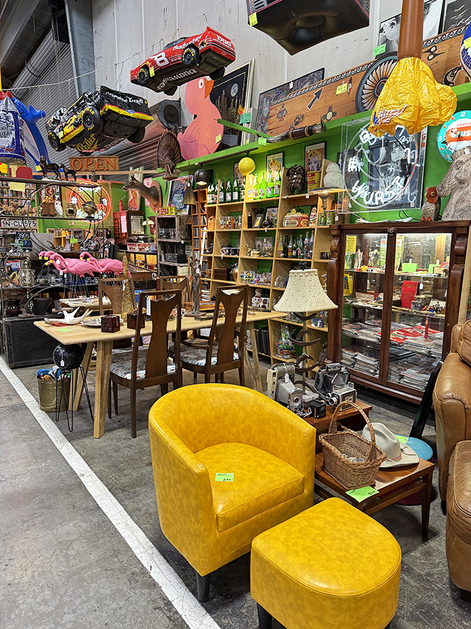 Step inside where mustard-yellow chairs and vintage treasures create a collector's paradise worth every minute of exploration.