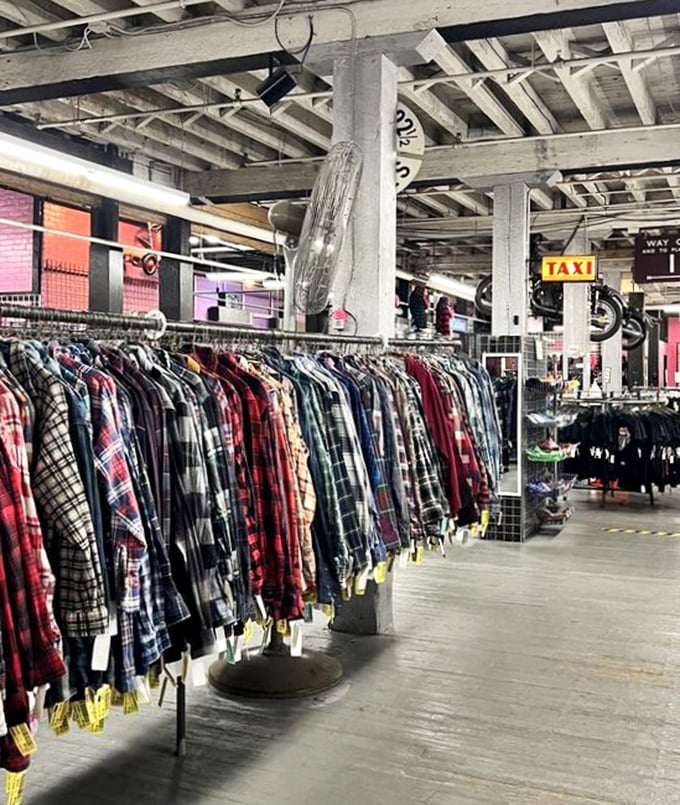 Racks upon racks of possibility! The Garment District's warehouse interior is a textile jungle of fashion history.